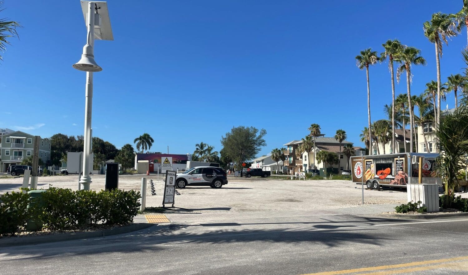 One parking lot meets city deadline; three closed - AMI Sun